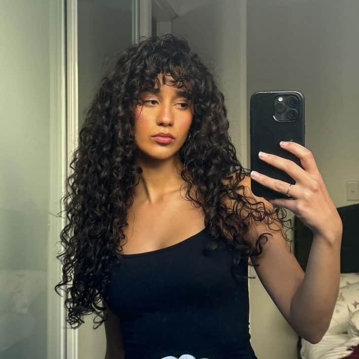 Curly hair : 30 Coiffures pour cheveux bouclés à exiger chez votre coiffeur